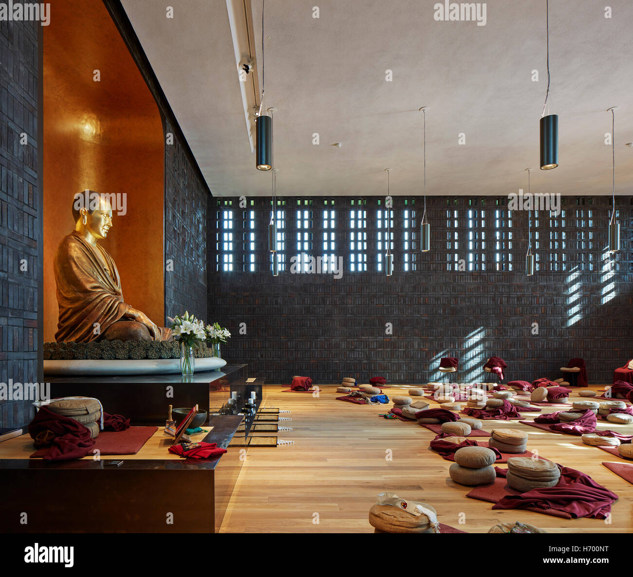Shrine room with Buddha figure and perforated brickwork clerestory ...