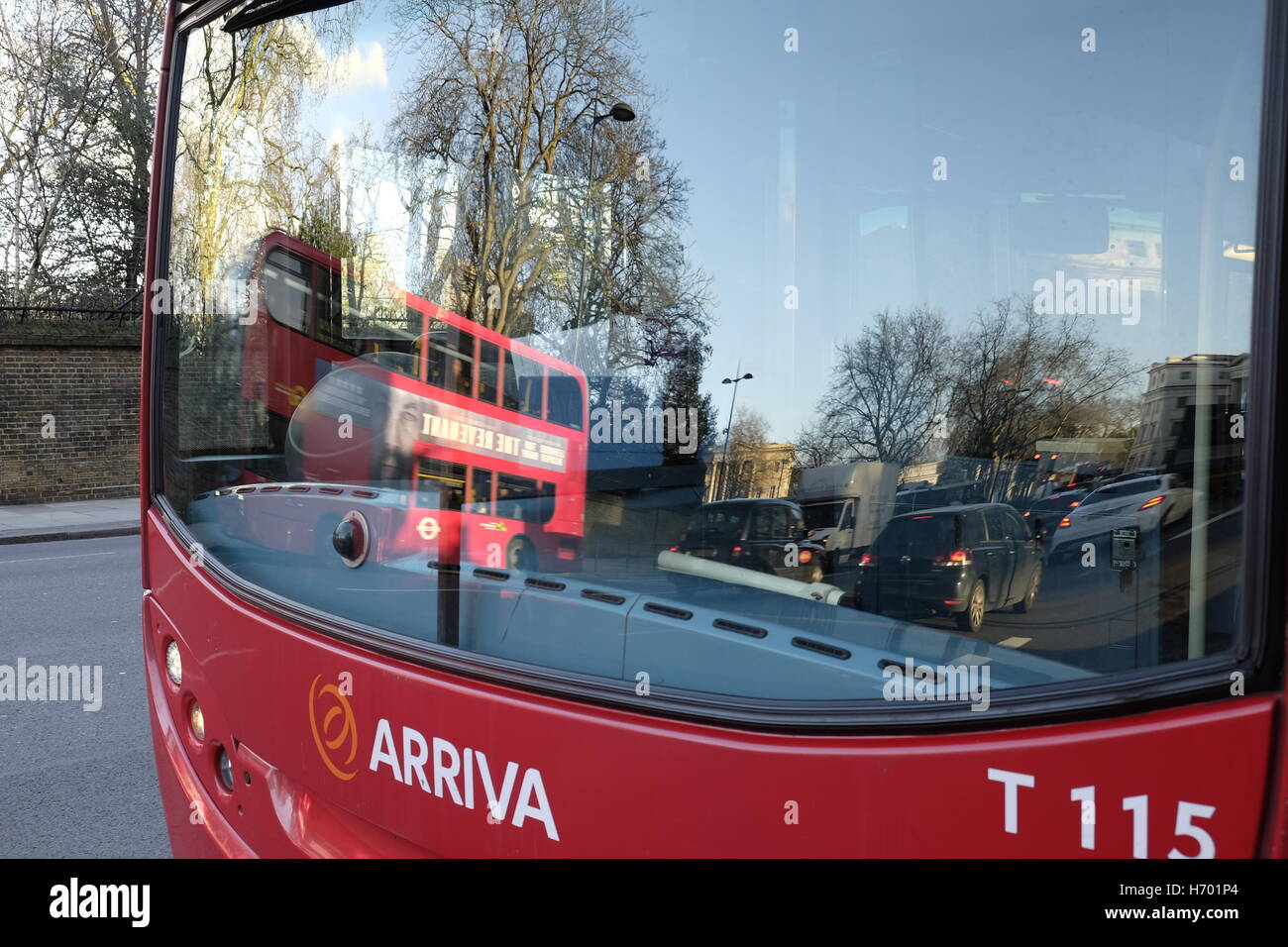 Reflection in a bus front window Stock Photo - Alamy