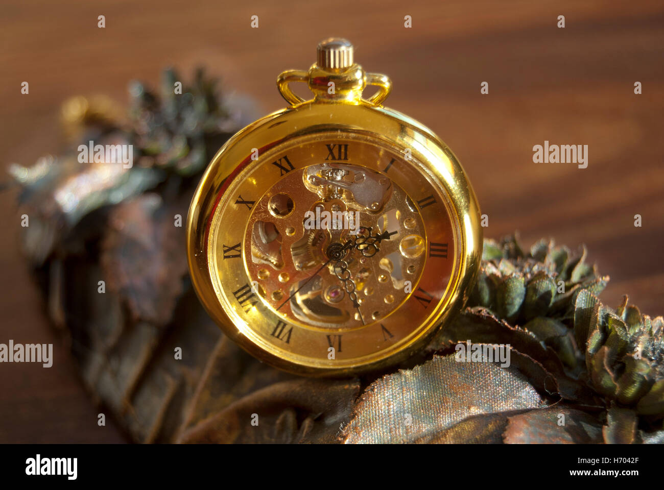 old pocket watch gold color Stock Photo - Alamy