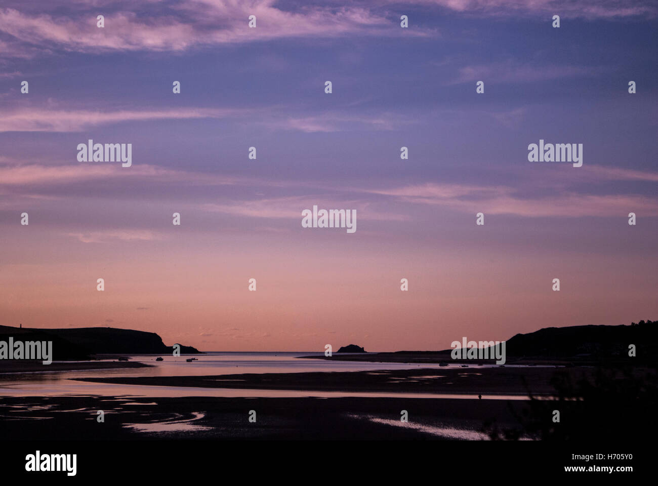 Sunset of many colors and silhouettes Stock Photo - Alamy