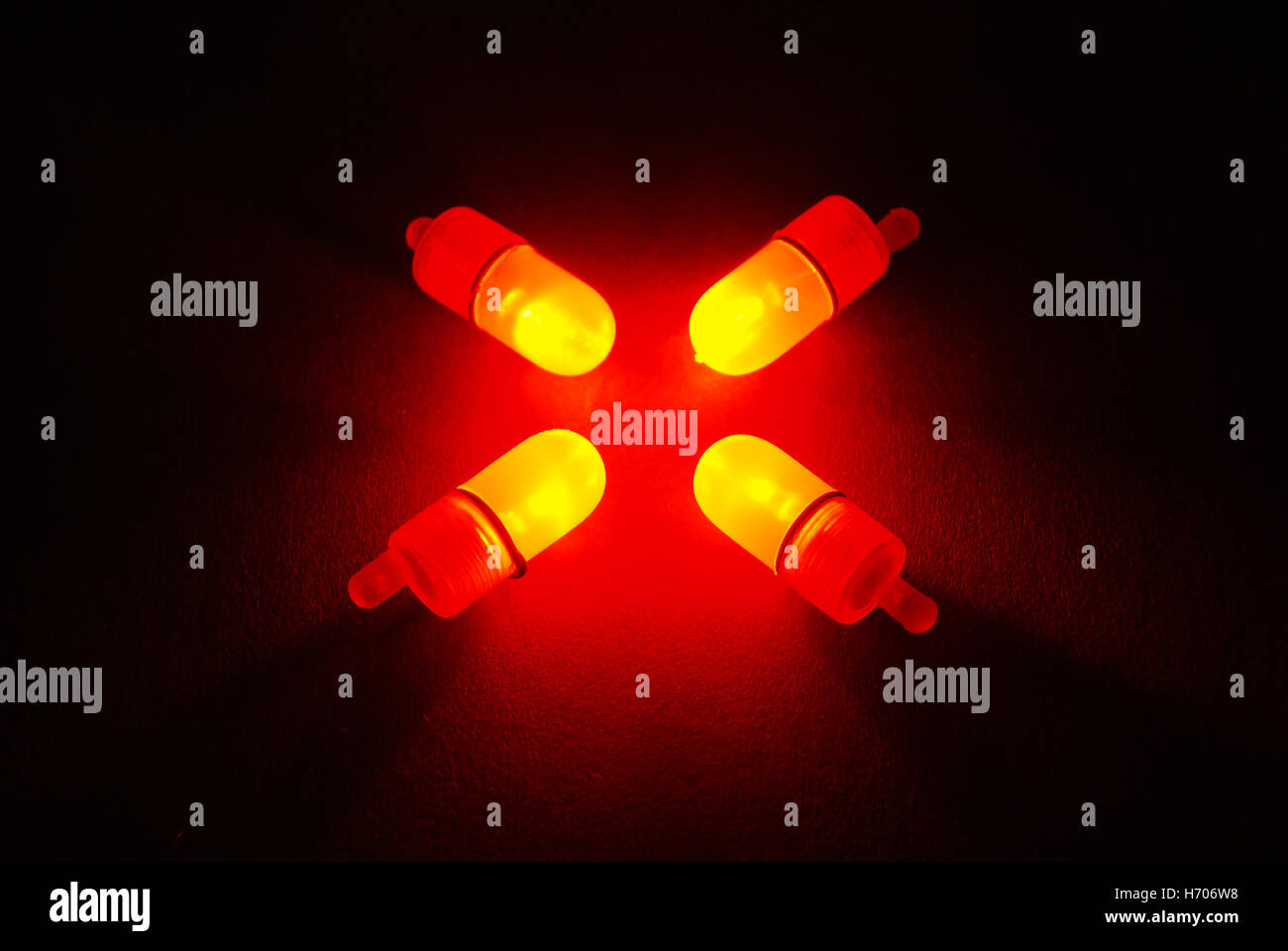 Fishing four red LED power indicators isolated on black background ...