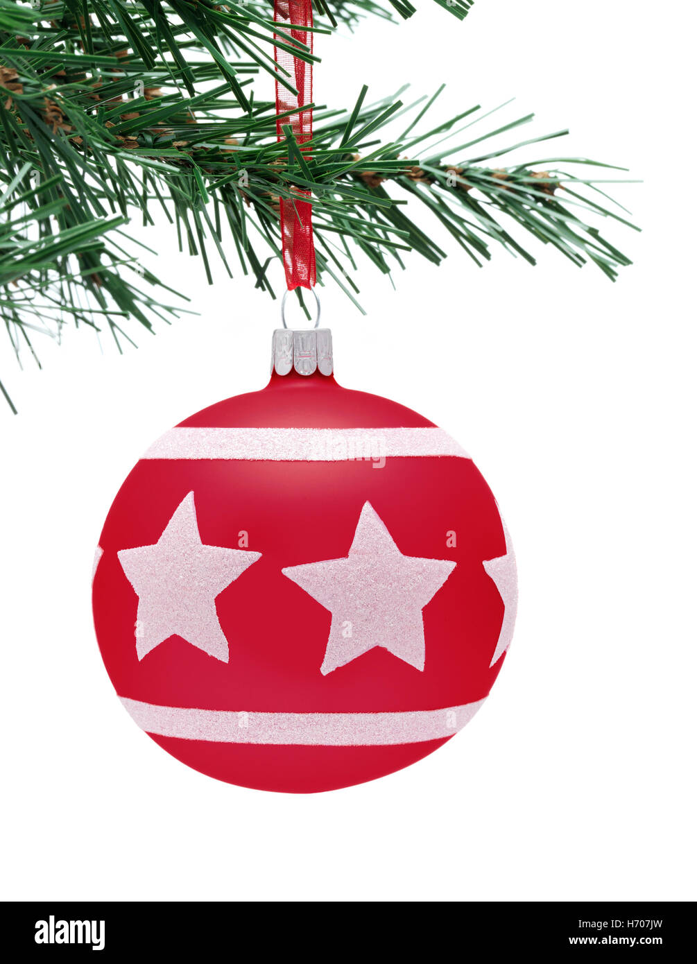 Red Bauble hanging from a Christmas tree Stock Photo - Alamy