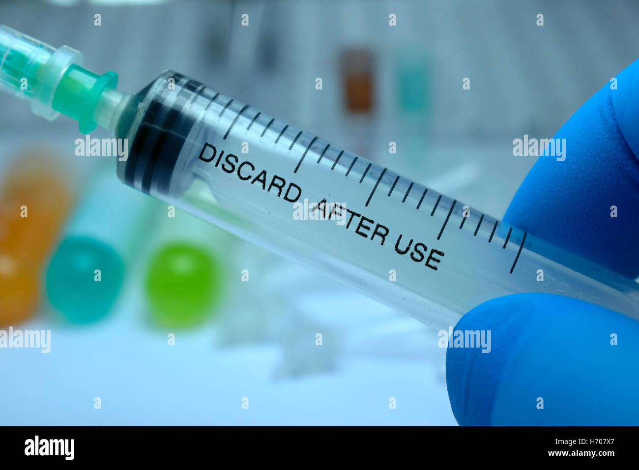 Syringe, medical injection in hand, palm or fingers. Medicine plastic ...