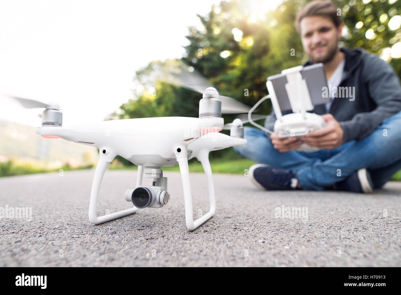 Man landing drone in nature hi-res stock photography and images - Alamy