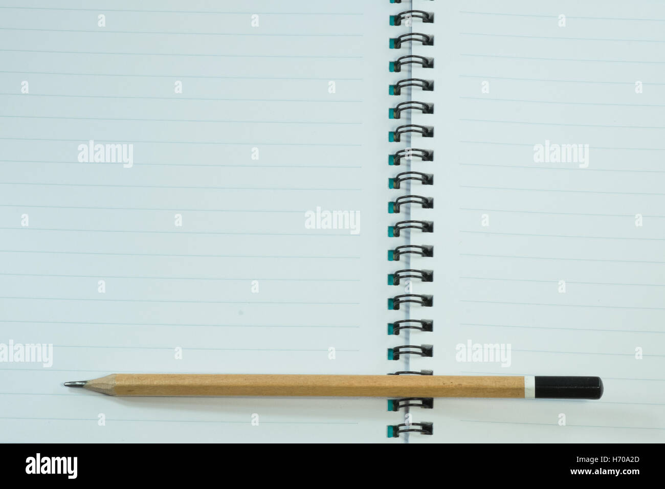 Paper and pencil Stock Photo - Alamy