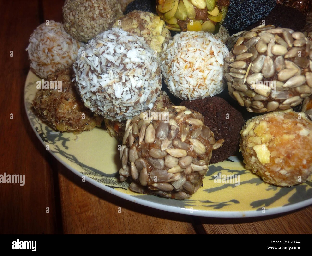 Candy of dried fruits and nuts. Healthy eating. raw food on a wooden ...