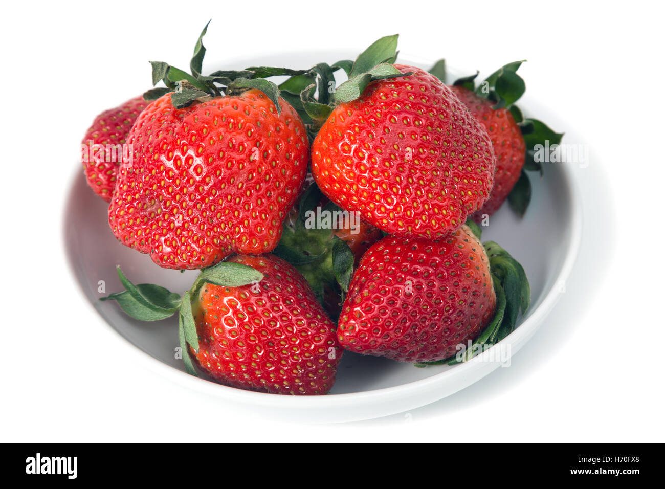 Strawberries on white Stock Photo - Alamy