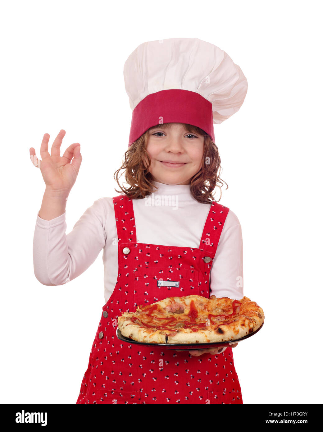 beautiful little girl cook with pizza Stock Photo - Alamy