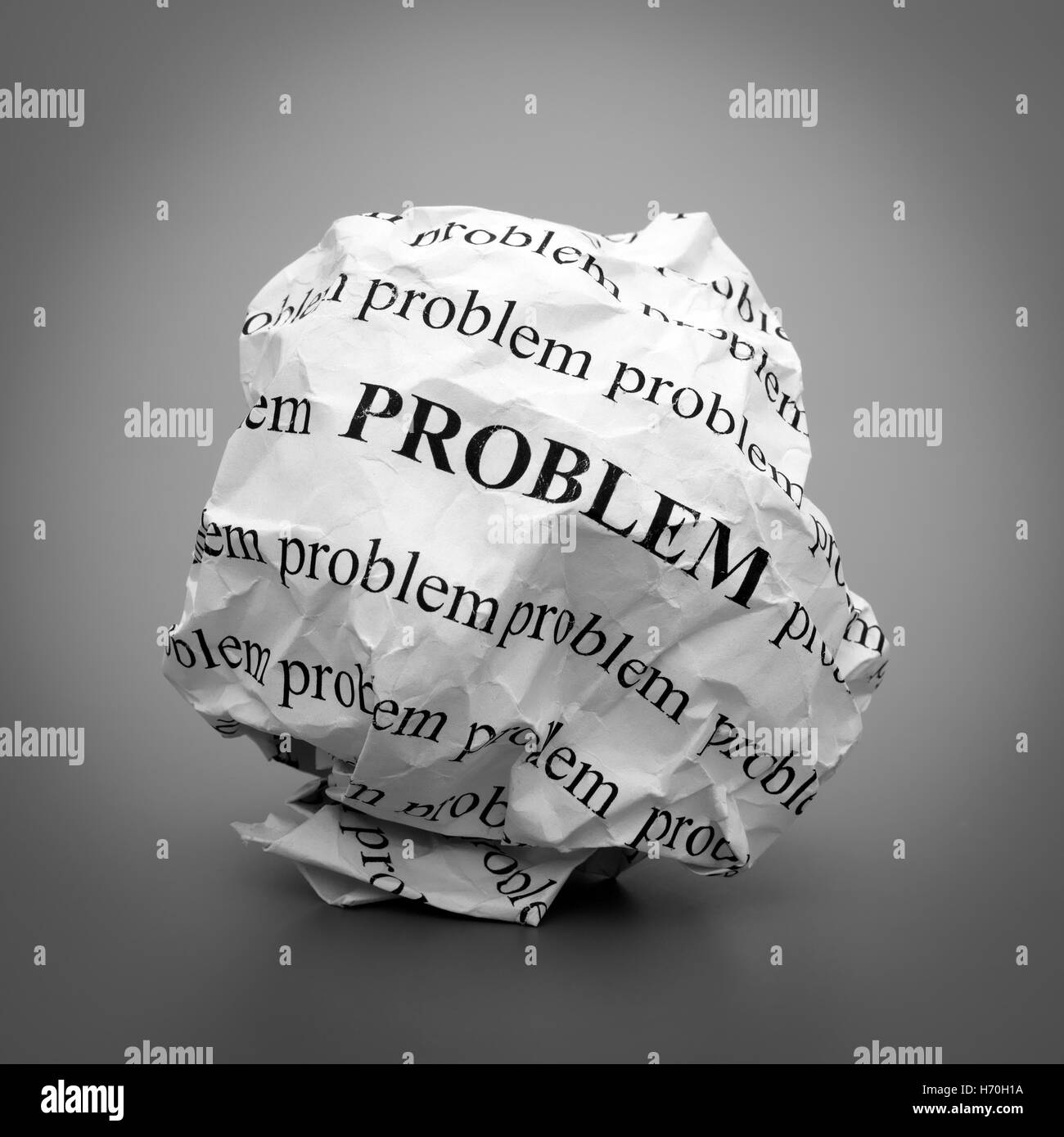 Crumpled paper ball with words Problem on gray background. Black and ...