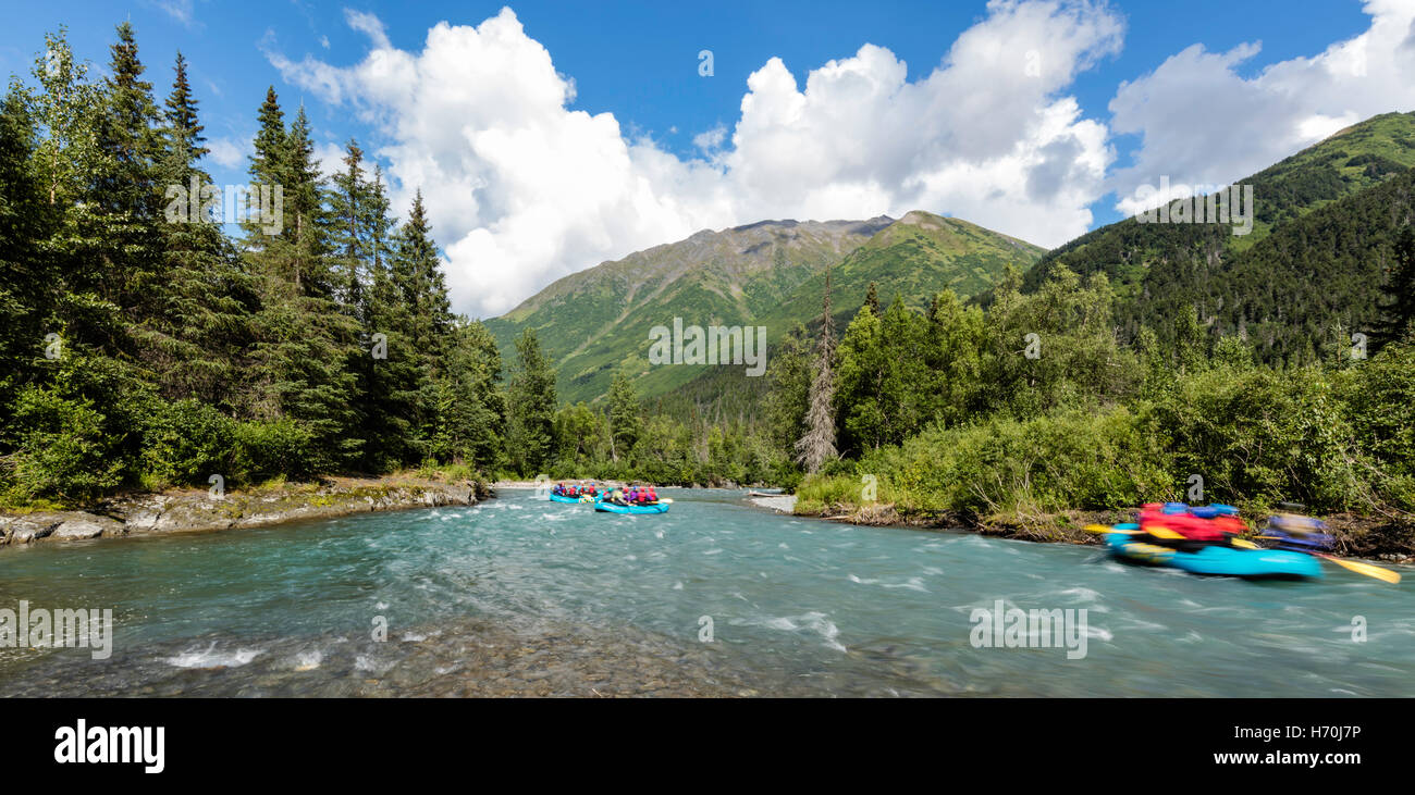 Whitewater rafters rafting down Sixmile Creek on the Kenai Peninsula in ...