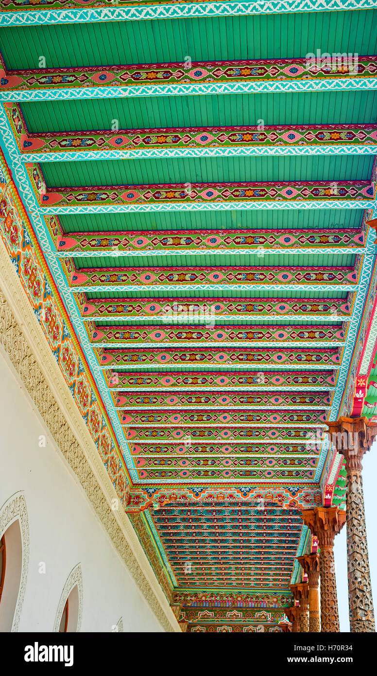 The wooden canopy of the Jami Mosque with colorful islamic patterns and ...