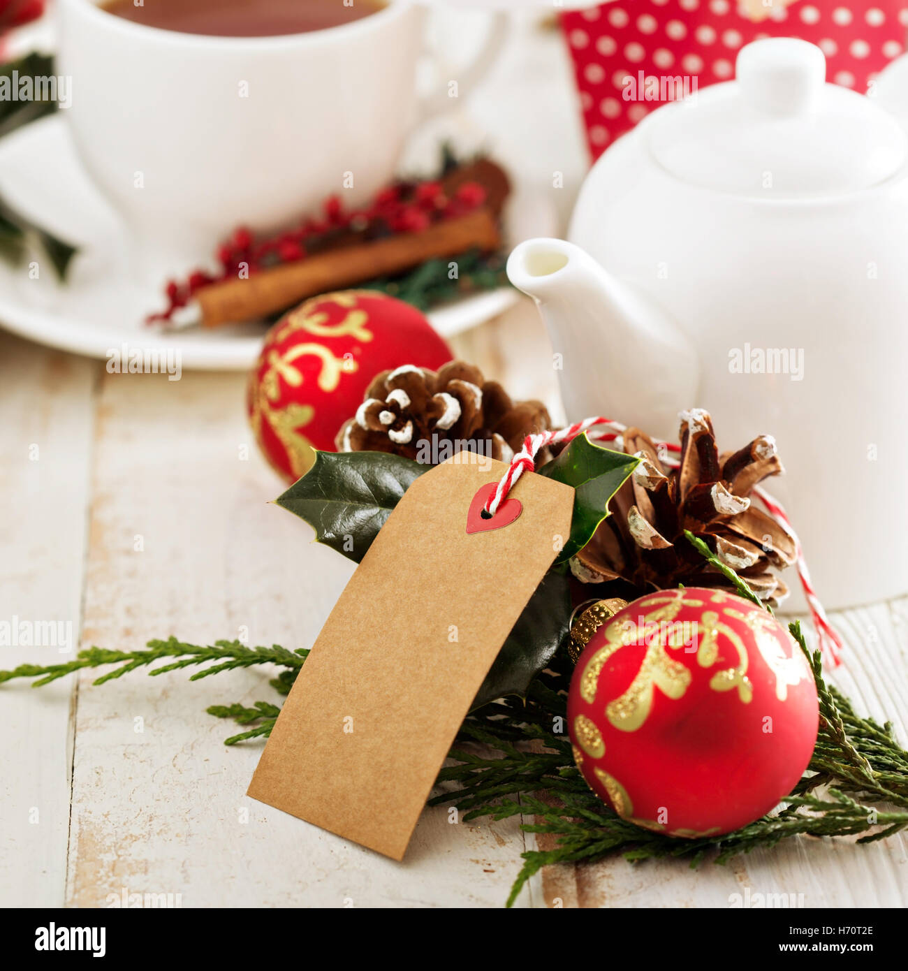 Chrismas themed tea with gift tag and decorations Stock Photo - Alamy