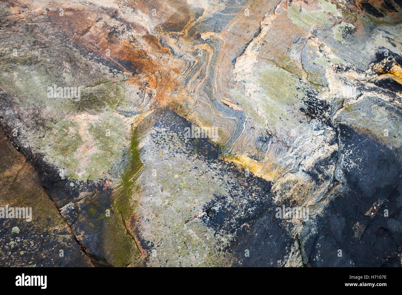 Colorful coastal stone background texture, Norwegian Sea coast, Norway ...