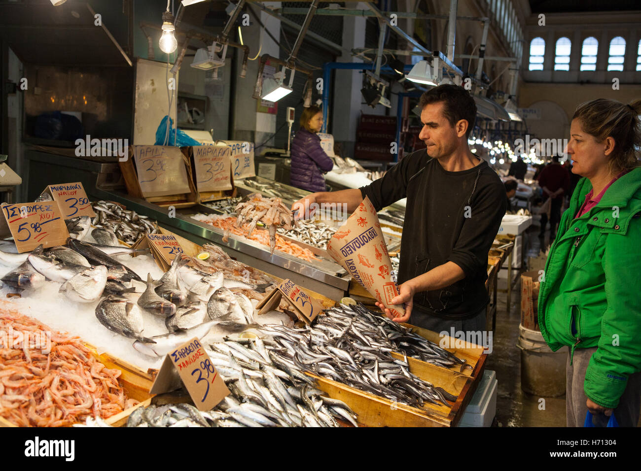 Fishmonger squid hi-res stock photography and images - Alamy