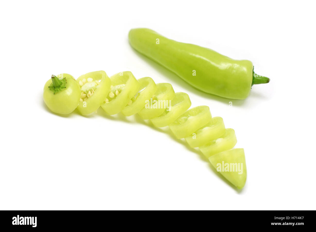 green sweet pepper or capsicum isolated on white background Stock Photo ...