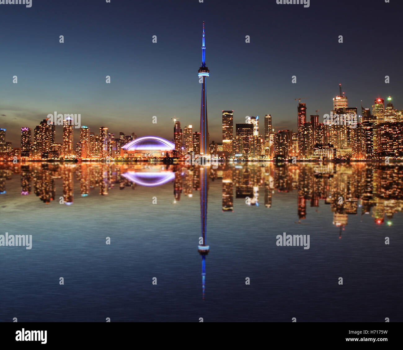Toronto Skyline at night with a reflection in Lake Ontario, Canada ...