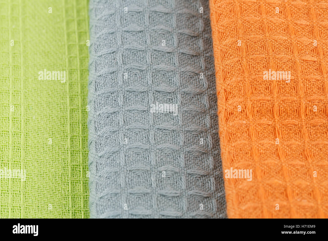 Stack of colorful kitchen towels closeup picture Stock Photo - Alamy