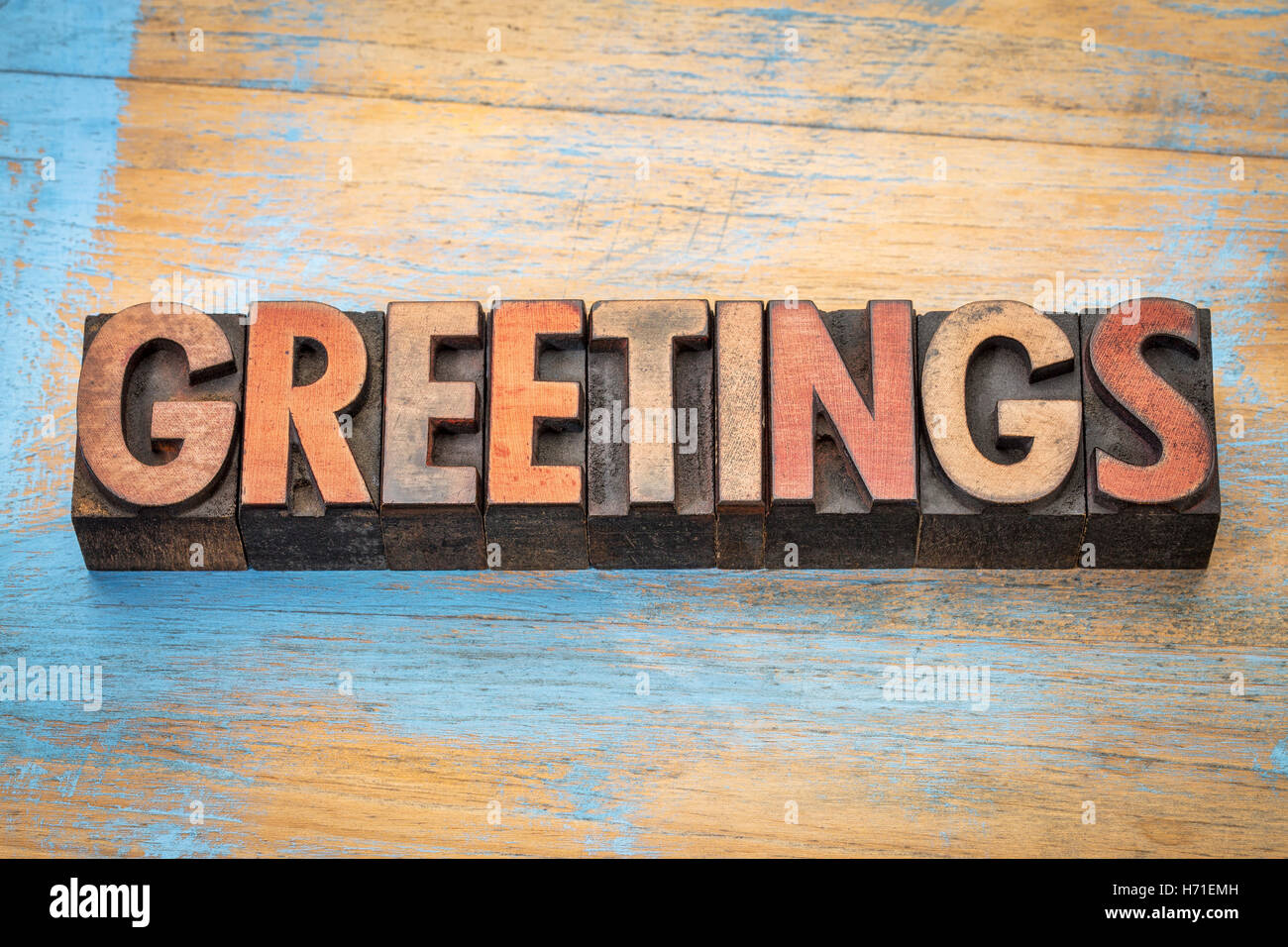 greetings - word abstract in vintage letterpress wood type printing ...