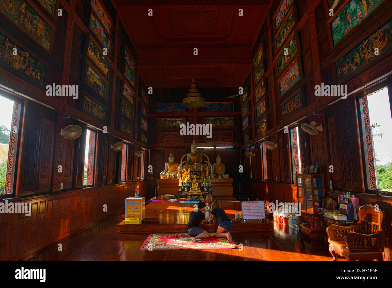 Monk giving blessing in the Wat Ao Noi temple, Prachuap Khiri Khan ...