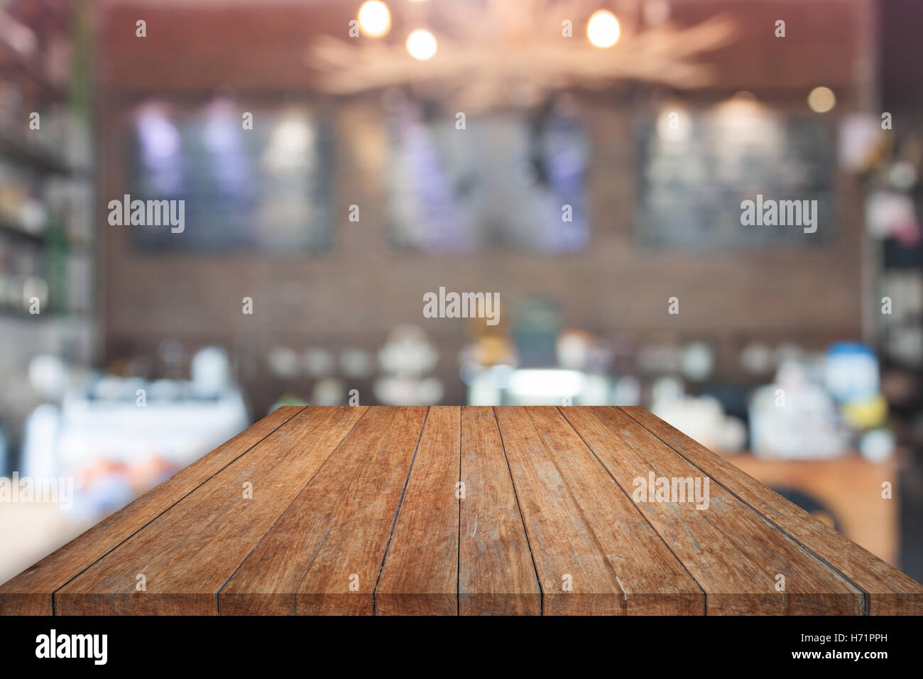 Brown table top with blurred cafe. product display template Stock Photo ...