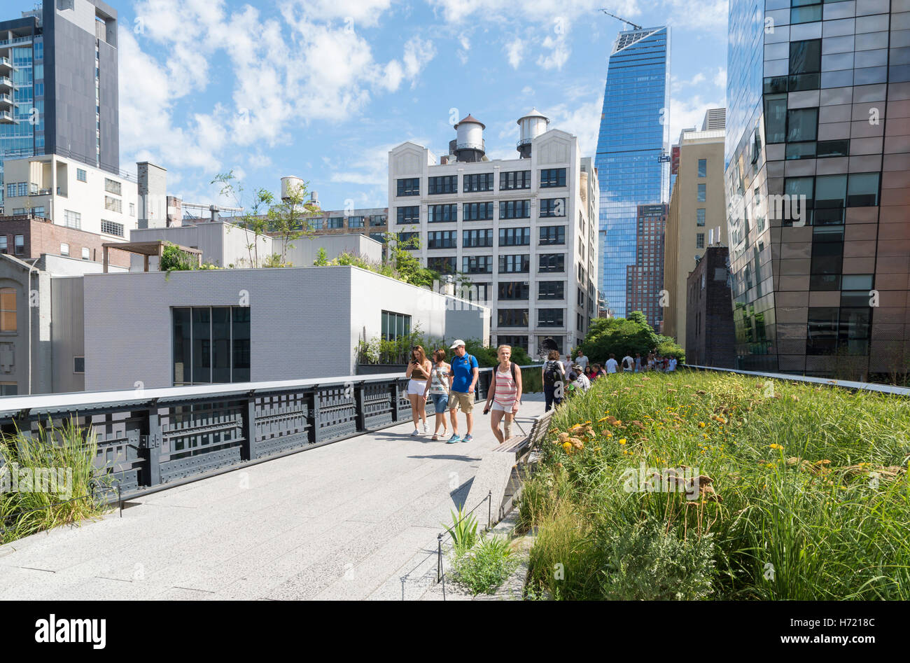 View of the High Line Park in Chelsea with people walking along it in ...