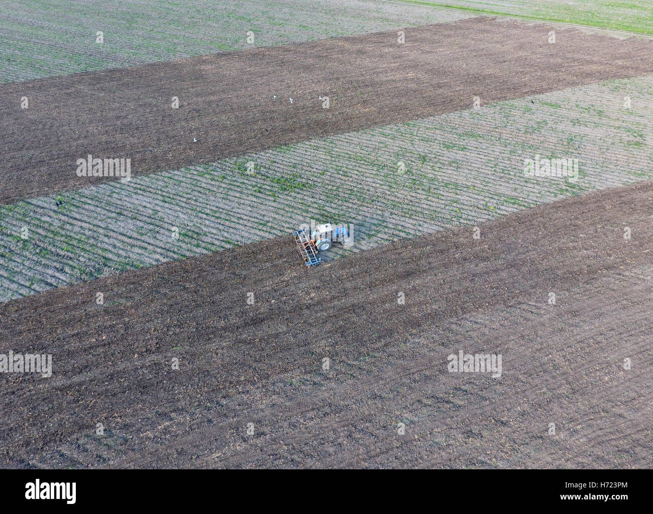Aerial view behind tractor plows hi-res stock photography and images ...
