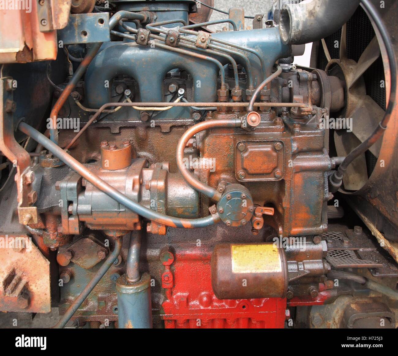 The aging motor of an old tractor is being repaired Stock Photo - Alamy