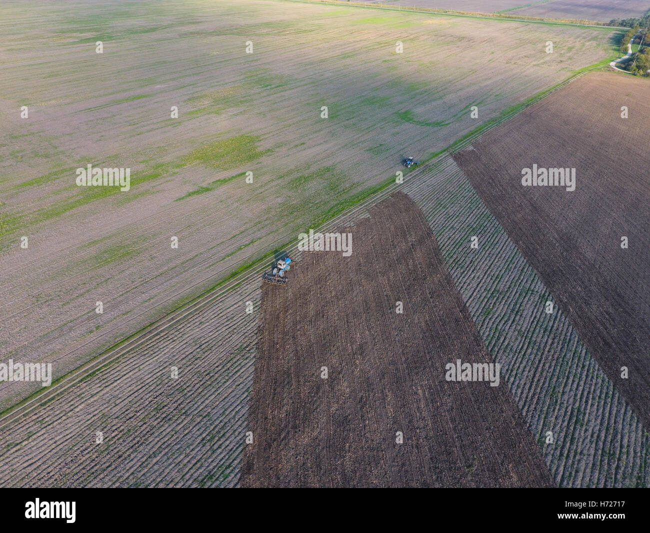 Top view of the tractor that plows the field. disking the soil. Soil ...