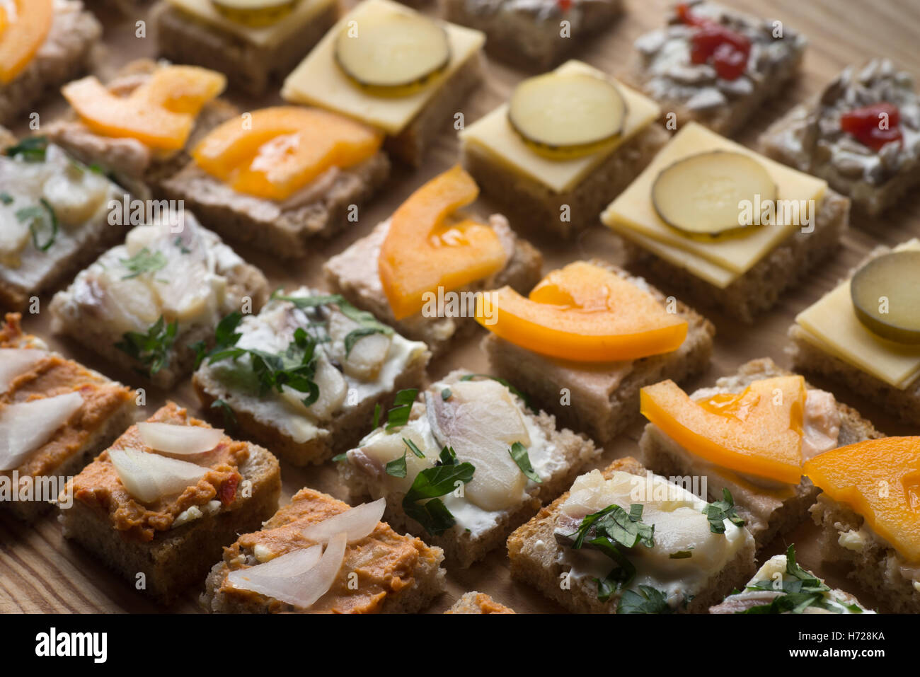 small homemade canapes variety of finger food Stock Photo - Alamy