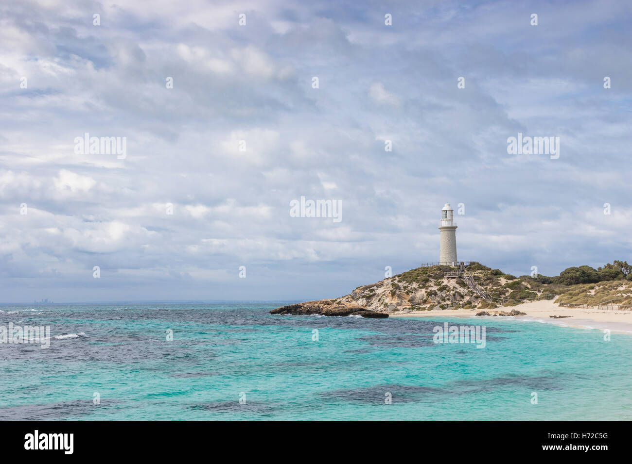 Cloudy skies over Pinky Beach and Bathurst Lighthouse at Rottnest ...