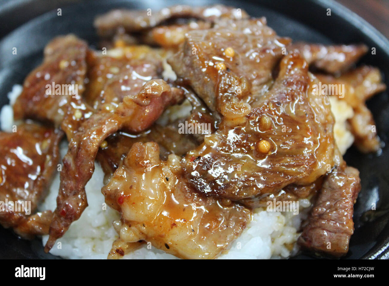 Wagyu beef with rice in the Kuromon Ichiba Market, Osaka, Japan Stock ...