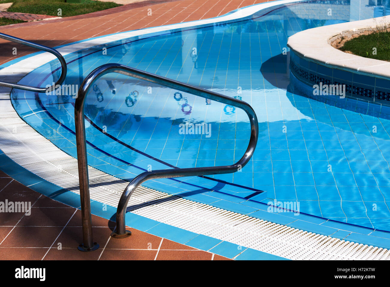 steel railings stairs pool with reflection Stock Photo - Alamy