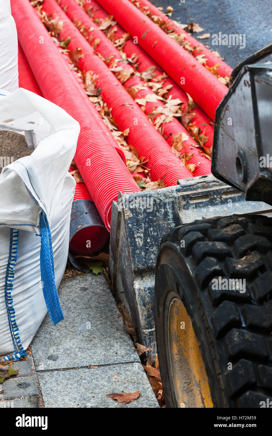 laying water pipe in the city Stock Photo - Alamy