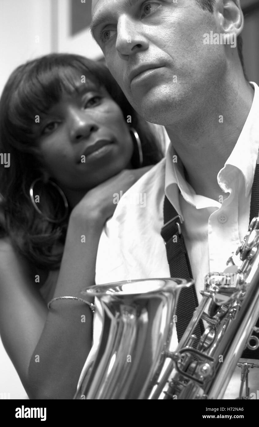 Black singer with saxophonist Stock Photo - Alamy