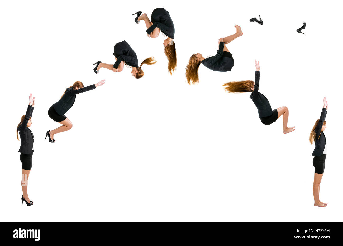 Business woman making a front flip Stock Photo - Alamy