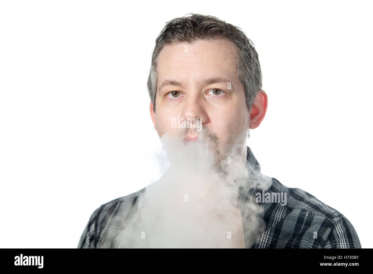 Inhaling men hi-res stock photography and images - Alamy