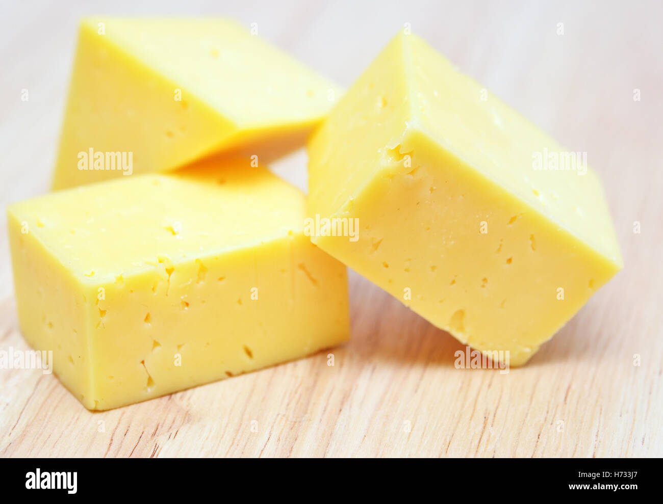 Pieces fresh yellow cheese hi-res stock photography and images - Alamy