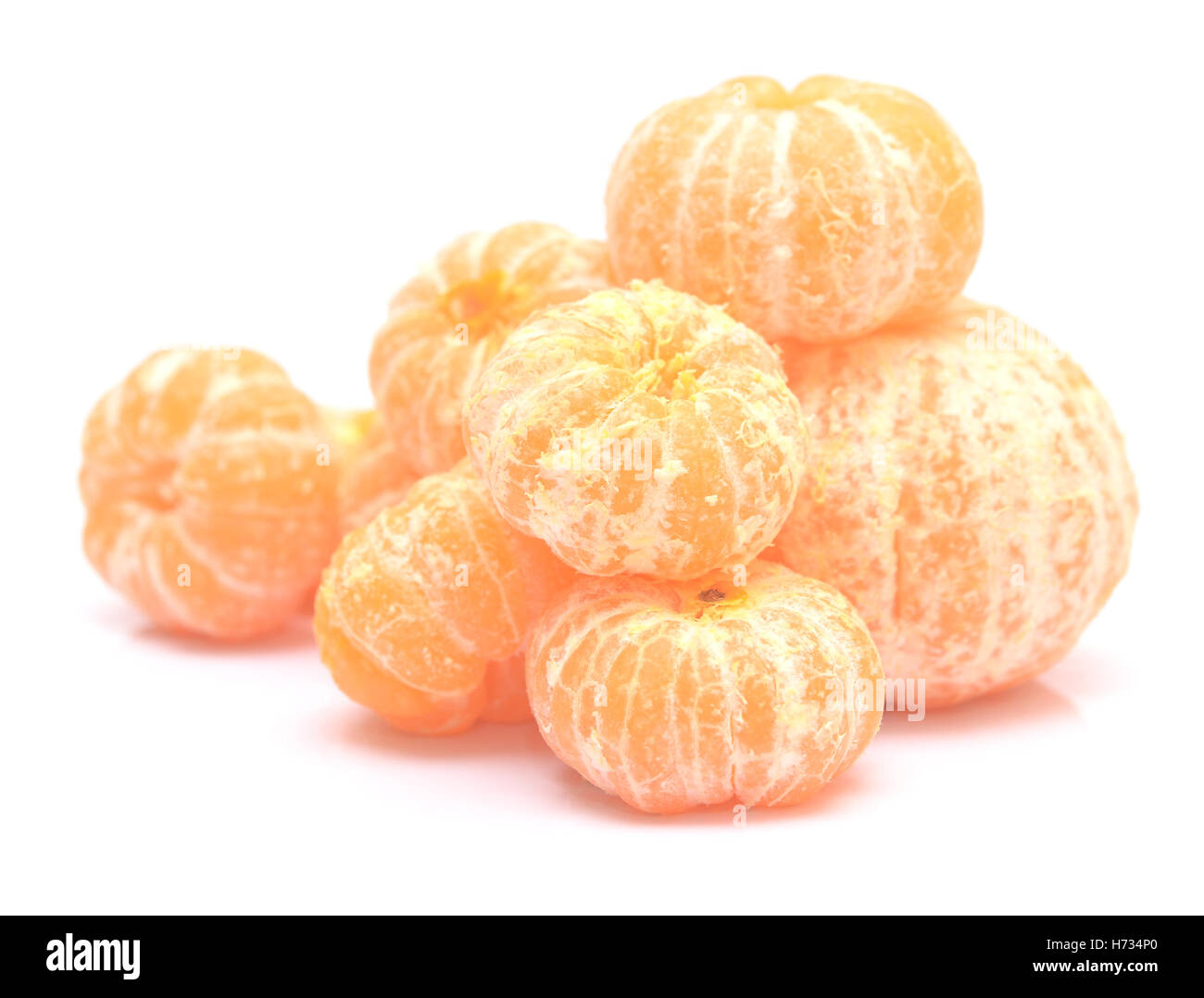 peeled tangerines isolated on white background Stock Photo - Alamy