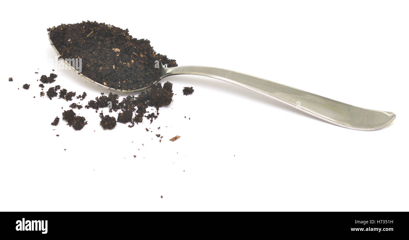 spoon with soil isolated on white background Stock Photo - Alamy