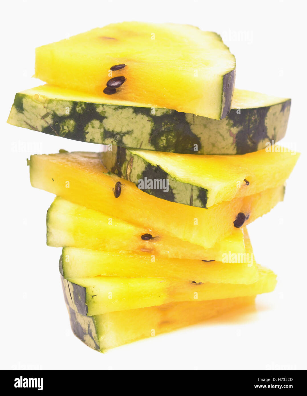 yellow watermelon slices isolated on white background Stock Photo - Alamy