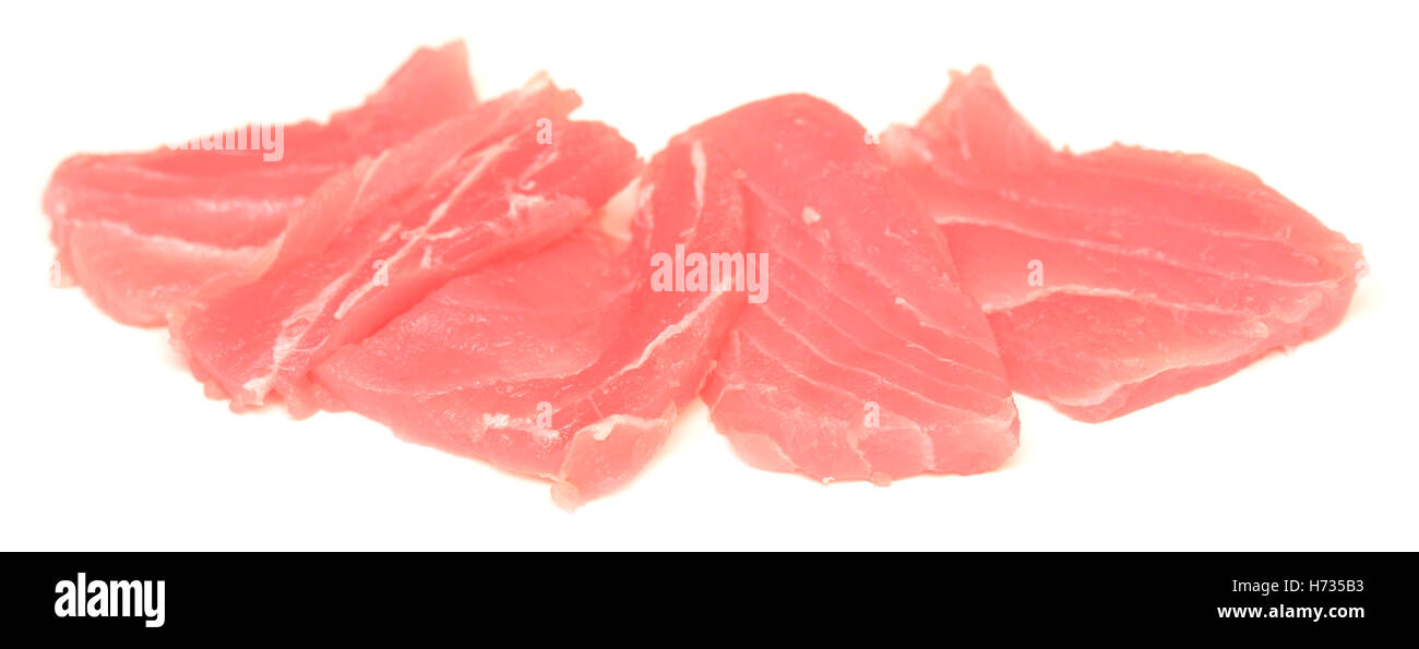 slices of tuna meat isolated on white background Stock Photo - Alamy
