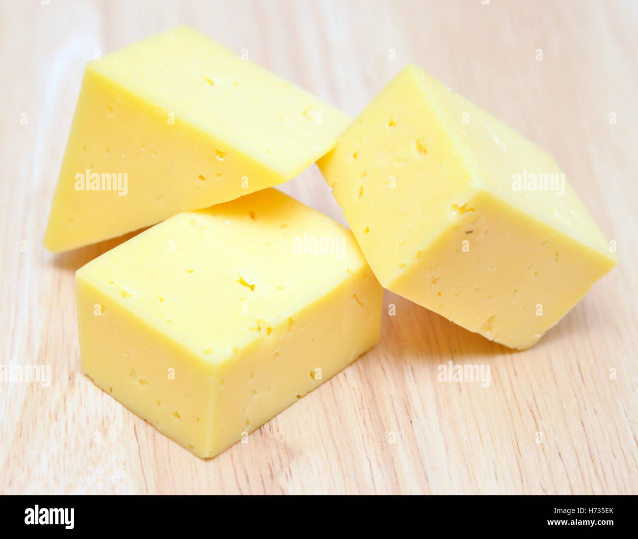 Pieces fresh yellow cheese hi-res stock photography and images - Alamy