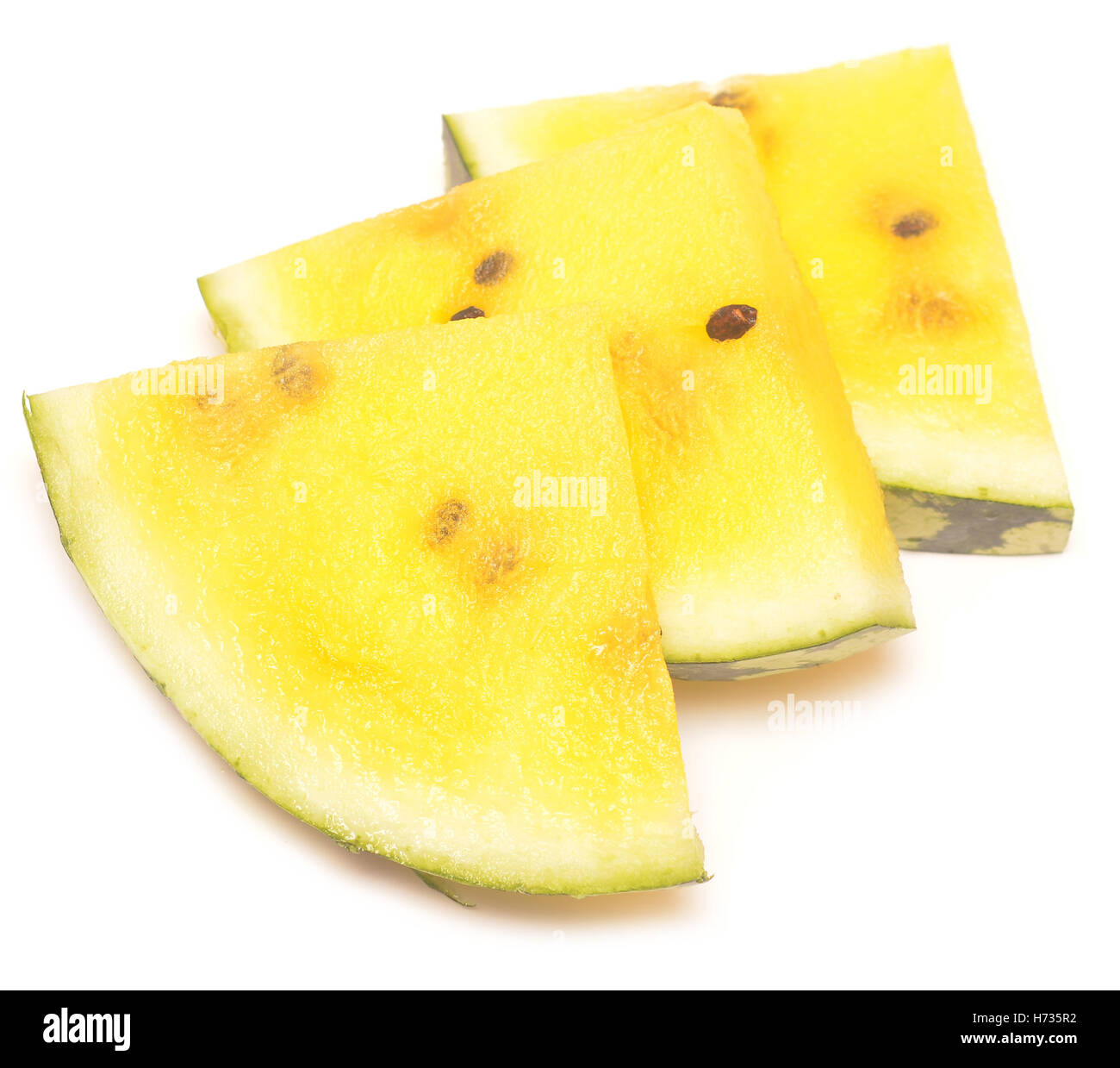 yellow watermelon slices isolated on white background Stock Photo - Alamy