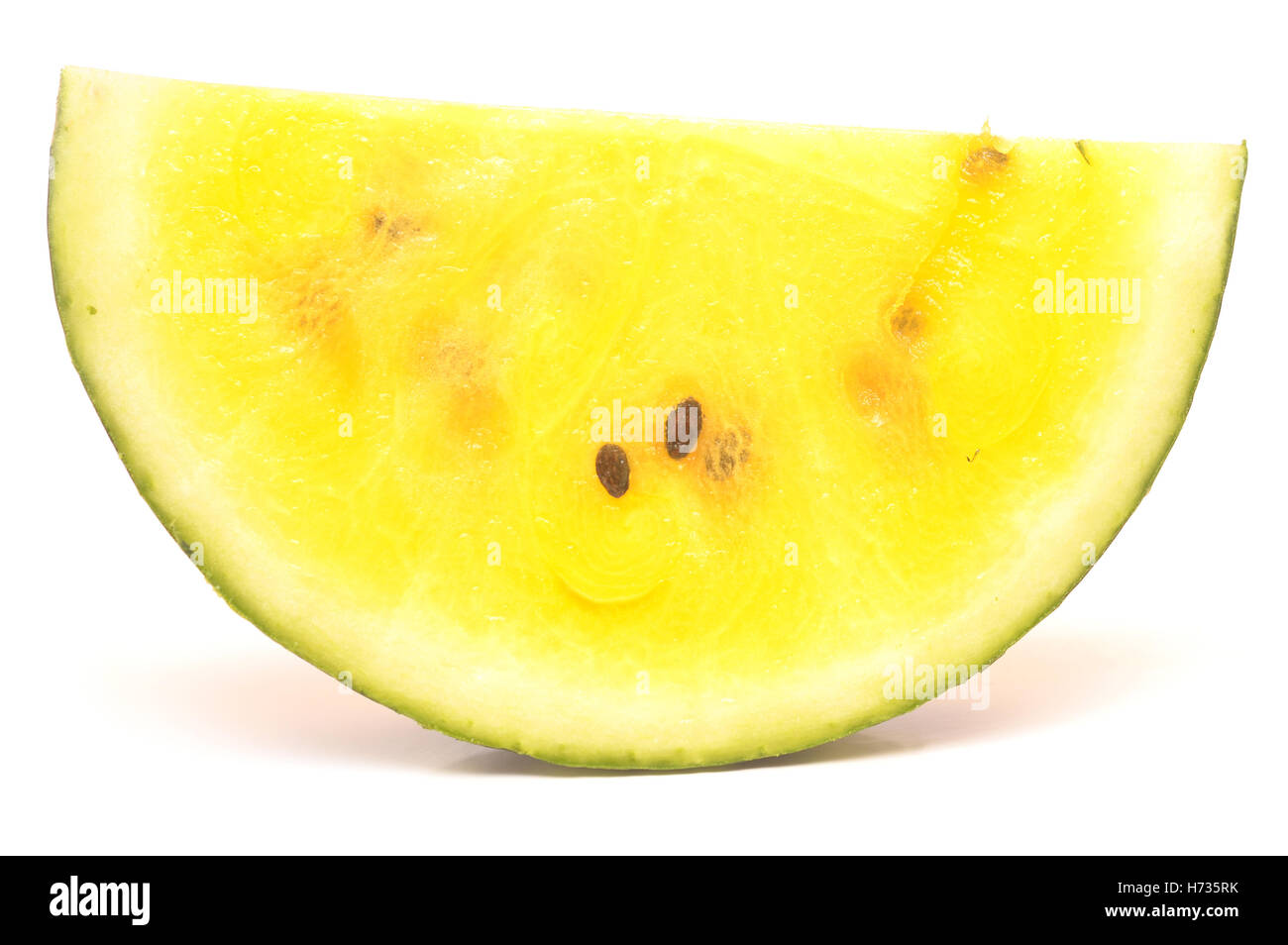 yellow watermelon slice isolated on white background Stock Photo - Alamy