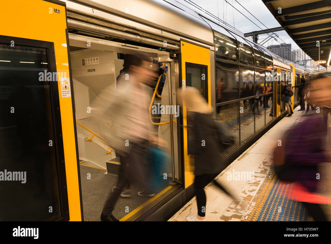 People getting on and off a suburban Tangara class train at Central ...