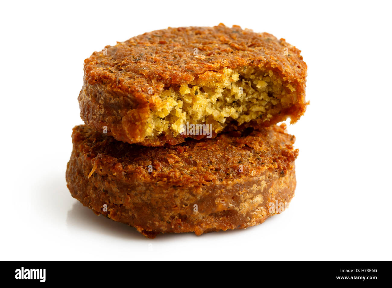 Two pieces of falafel isolated on white Stock Photo - Alamy