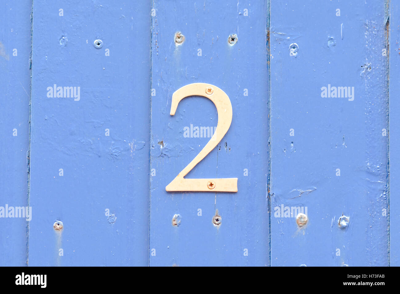 House Number 2 sign on gate Stock Photo - Alamy