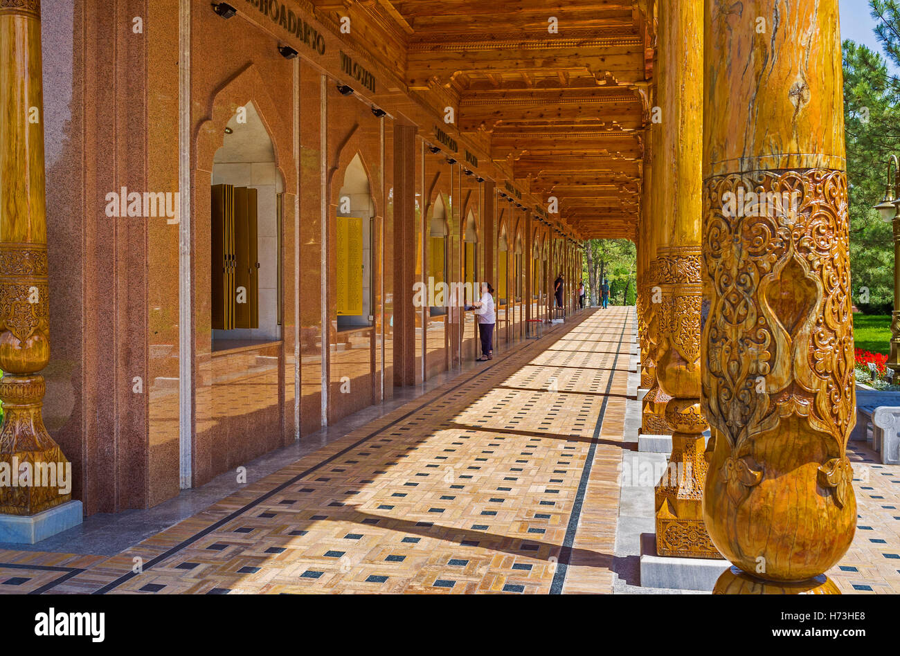 The carved wooden pillars of the Second World War Memorial complex ...