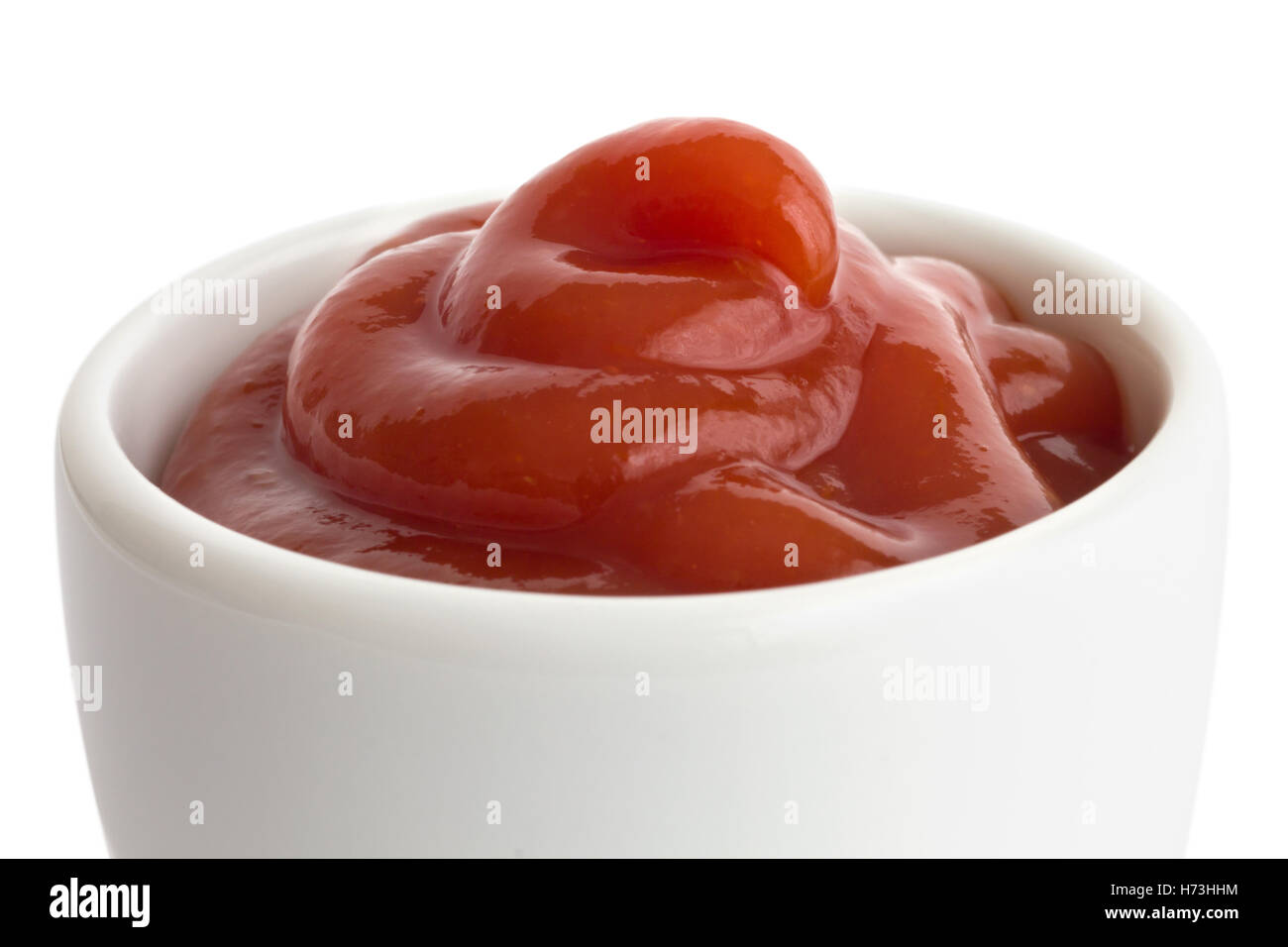 Ketchup in white ceramic ramekin. White background Stock Photo - Alamy