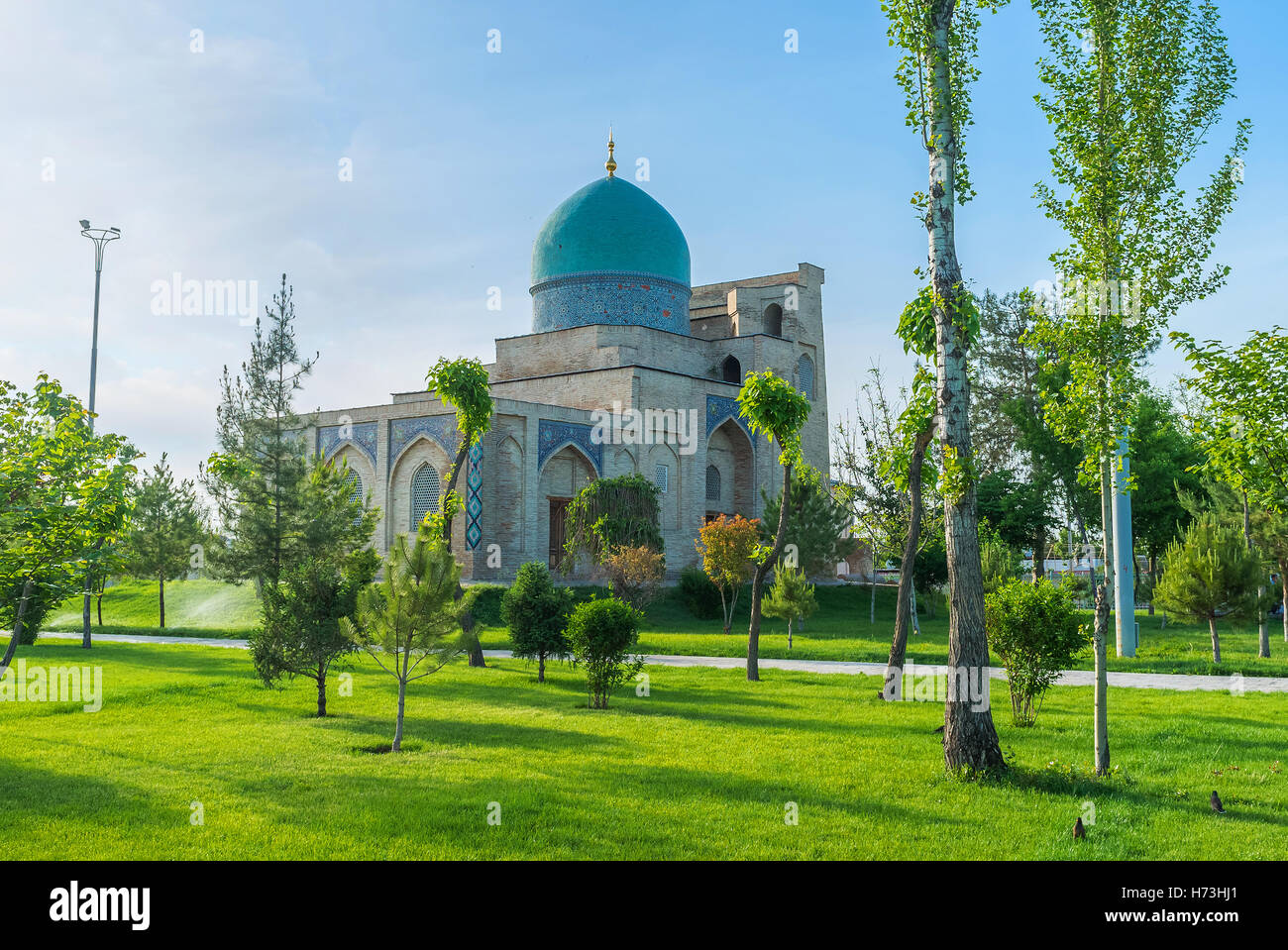 The side walls and the blue tiled dome of Kaffal Shashi Mausoleum, that ...